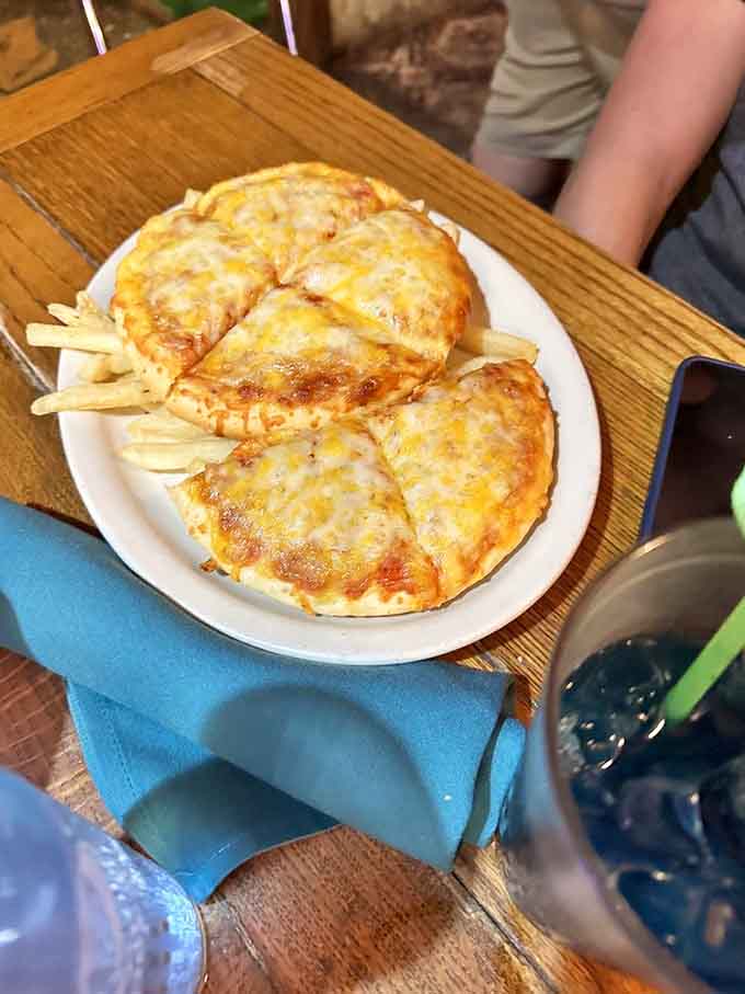 Cheese pizza that proves sometimes the simplest things done right are exactly what you need for happiness.