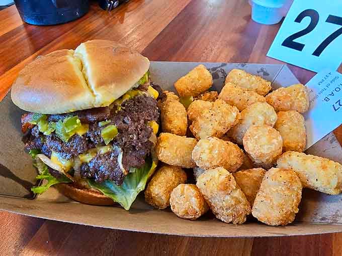 When your burger comes with golden tater tots, you know someone in that kitchen truly understands happiness.
