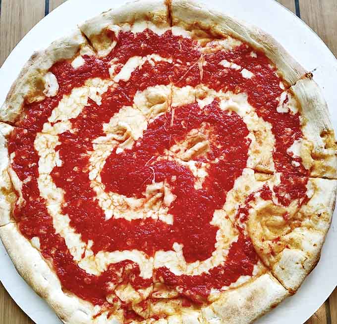 The classic tomato pie in all its glory, proving that sometimes less really is spectacularly, wonderfully more.