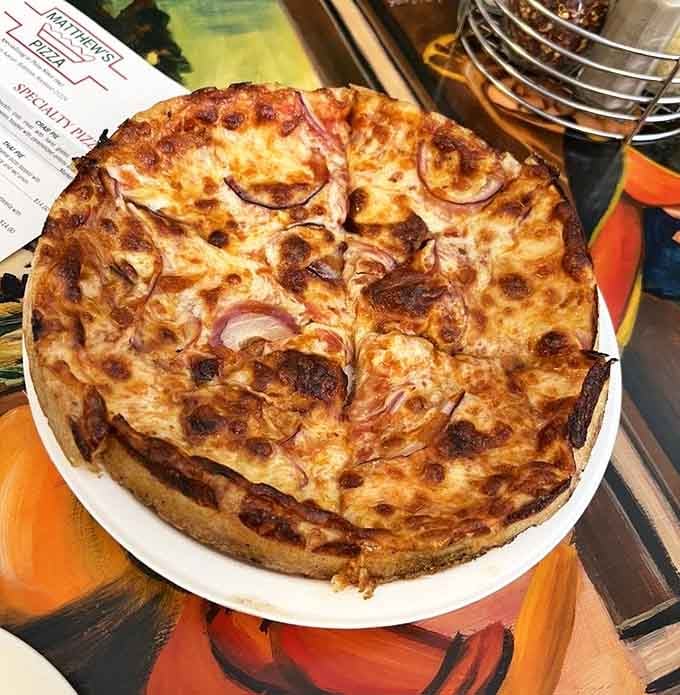 Thai pie brings unexpected flavors to pizza night, proving this place has been innovating since before fusion was cool.