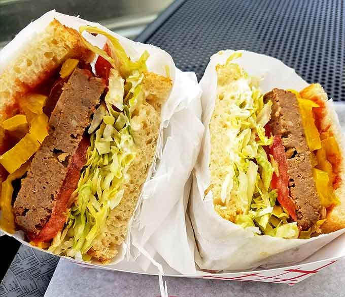 Thick slabs of meatloaf nestled in ciabatta with all the fixings: comfort food that requires architectural planning to eat.
