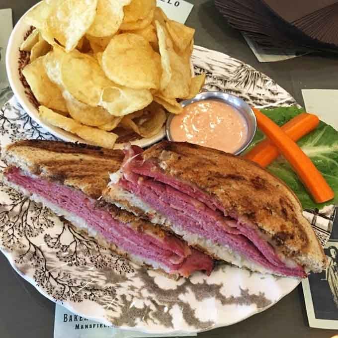 A Reuben this beautiful deserves its own photo shoot, complete with chips and that mysterious pink sauce begging investigation.