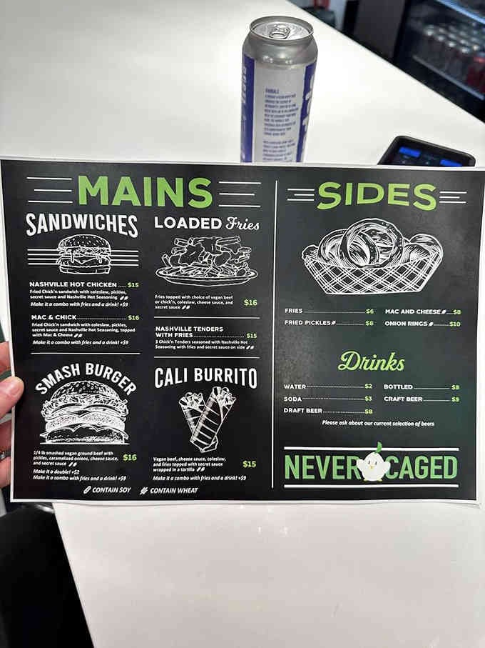 The menu keeps things simple: good sandwiches, loaded fries, and cold drinks for hungry bowlers.