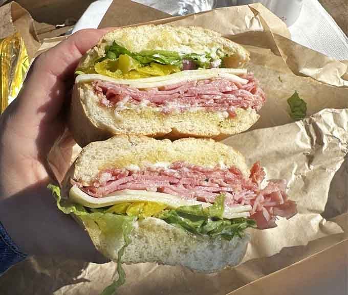 That Italian sub is loaded with meats and peppers, the kind of sandwich that requires strategic planning.