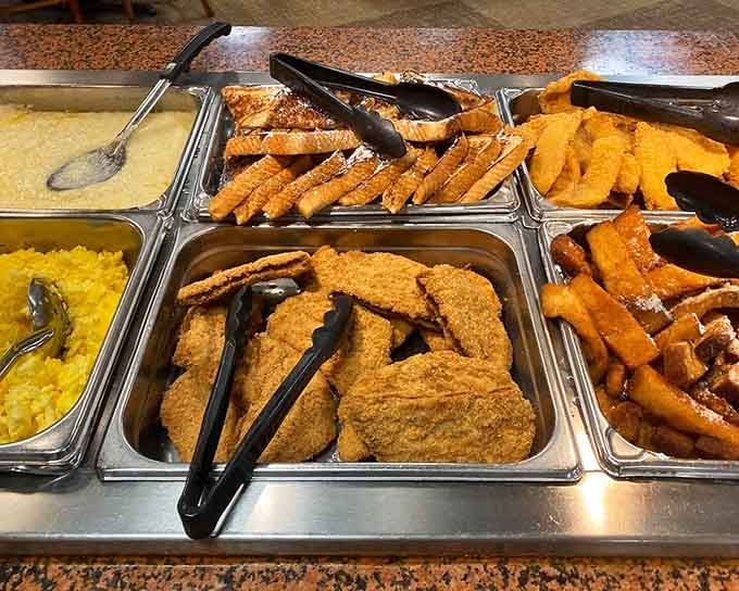 Golden fried catfish lined up like edible soldiers, ready to march straight into your heart and stomach.