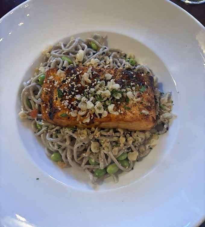 Miso-glazed salmon over soba noodles brings unexpected Asian flair to this lakeside gem with impressive results.
