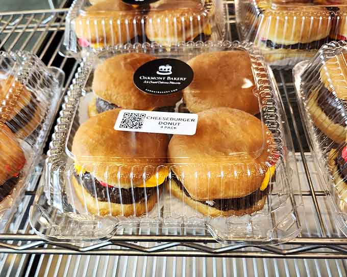 A cheeseburger donut exists here, defying both logic and dietary guidelines while looking absolutely magnificent in its audacity.