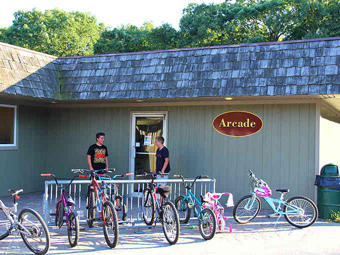 The arcade: where quarters disappear faster than your resolve to "just play one game" before heading back outside.
