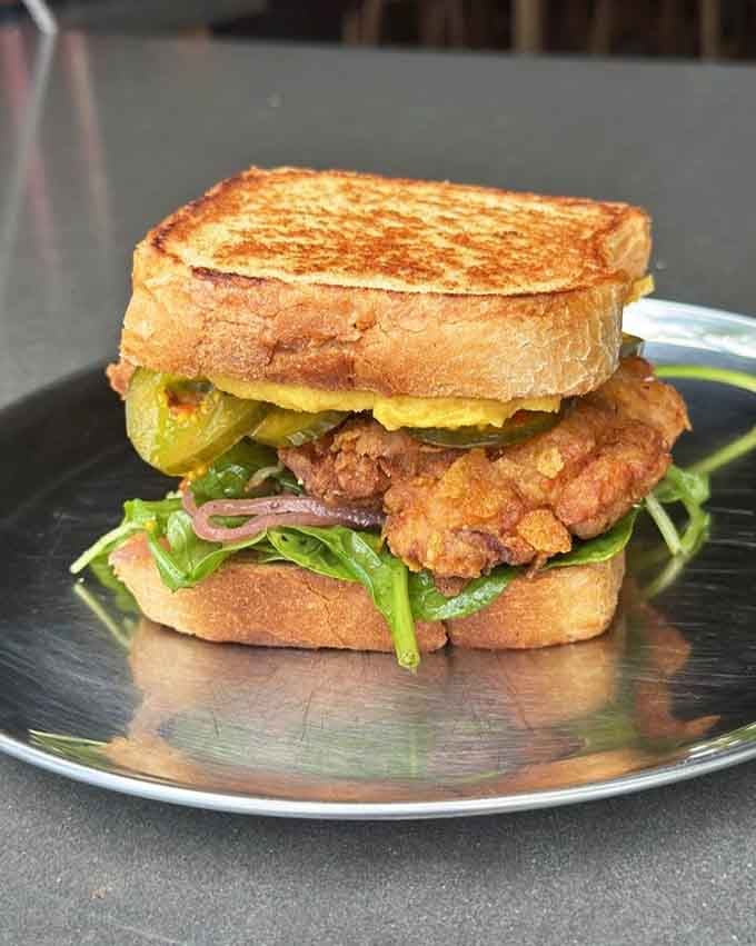 Golden fried chicken gets the spicy treatment it deserves, proving breakfast sandwiches can have serious attitude.