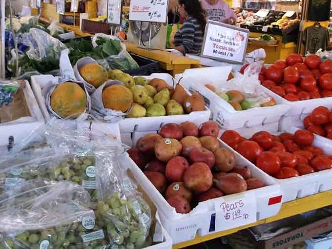 Fresh produce that actually looks like it came from a farm, not a laboratory, arranged in beautiful abundance.