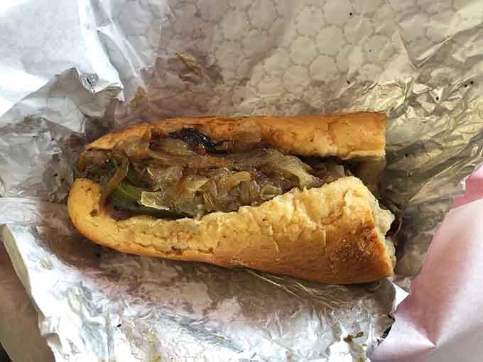 Italian beef tucked into fresh bread, peppers adding just enough kick to keep things interesting and delicious.