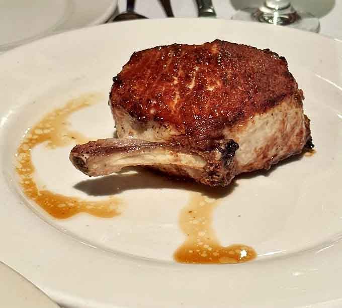 A pork chop this beautifully caramelized is what happens when the kitchen actually cares about your dinner.