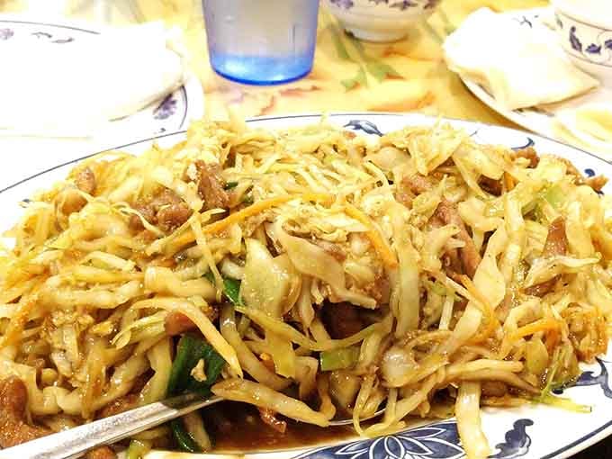 That mountain of Mu Shu Pork could feed a small army or one very determined diner with excellent priorities.