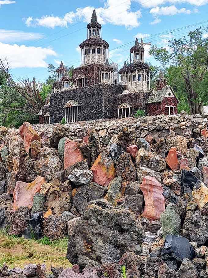Multiple towers rise from volcanic rock like a medieval city built by very patient, very determined hands.