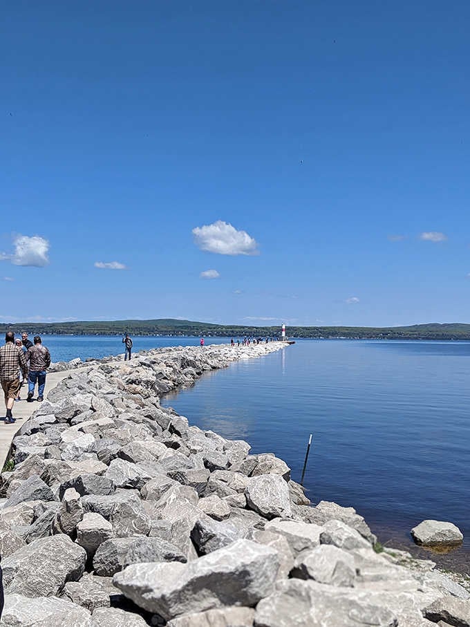 The breakwall stretches into Lake Michigan, inviting walks where the only decision is how long to stay and stare.
