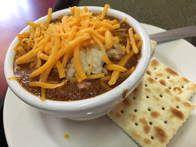 Chili topped with enough cheese to make your cardiologist nervous and your taste buds ecstatic beyond measure.
