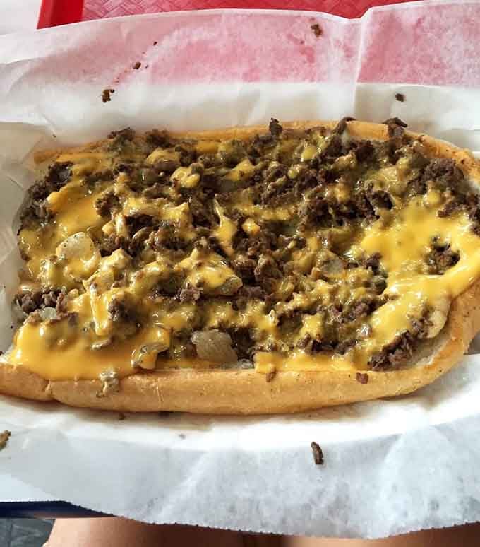 Look at that cheese coverage—this is what happens when a sandwich shop takes its craft seriously and holds nothing back.