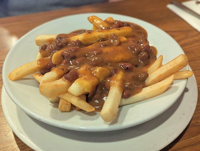 Chili cheese fries that require both hands and possibly a forgiving waistband, because some indulgences are worth the commitment.