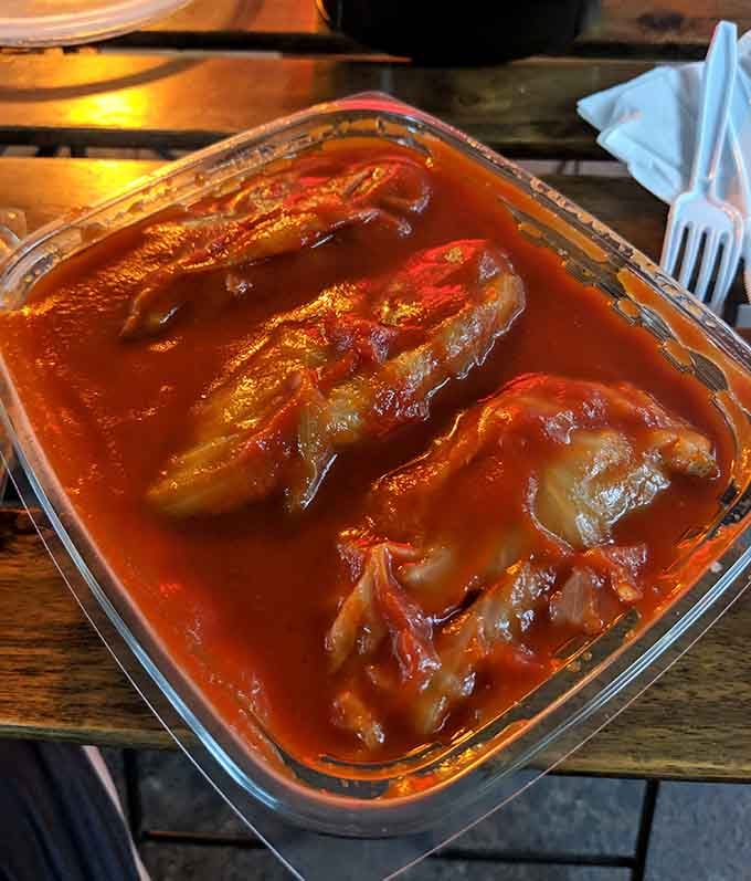 These cabbage rolls bathing in rich sauce are comfort food at its finest, no passport required for this delicious journey.