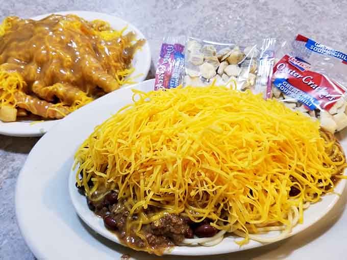 The three-way in all its glory: spaghetti, chili, and a cheese mountain that defies both gravity and moderation.