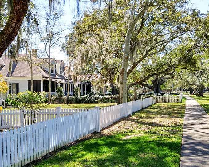 White picket fences and oak-lined streets where every home looks like a Southern Living cover shoot.