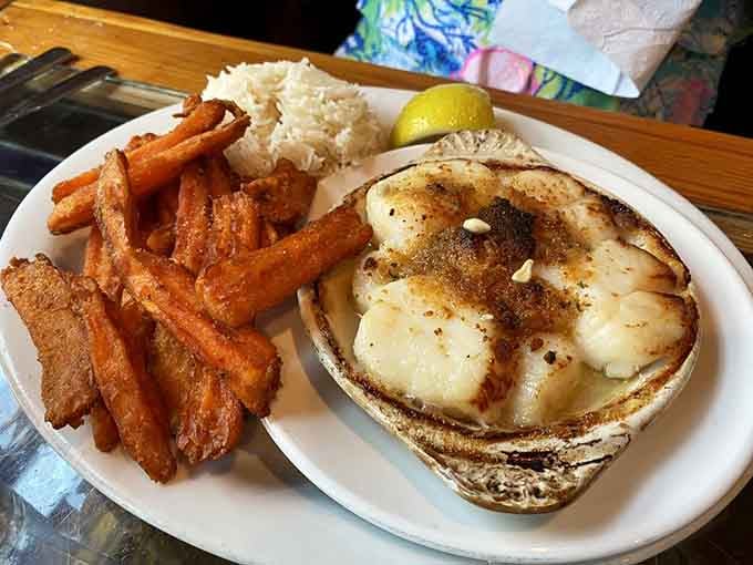 Baked scallops in the shell with rice pilaf: simple, elegant, and exactly what Cape Cod does best.