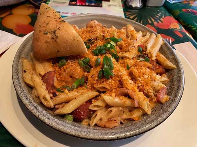 Mac and cheese elevated to gourmet status, proving comfort food works perfectly fine in the jungle too.