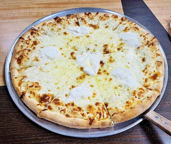 When toppings pile this high, you know the kitchen isn't holding back on flavor or generosity with ingredients.