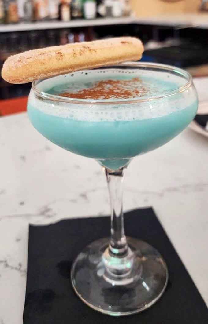 The Pistachio Tiramisu Martini looks like something from a dream&mdash;creamy, colorful, and topped with a ladyfinger cookie.