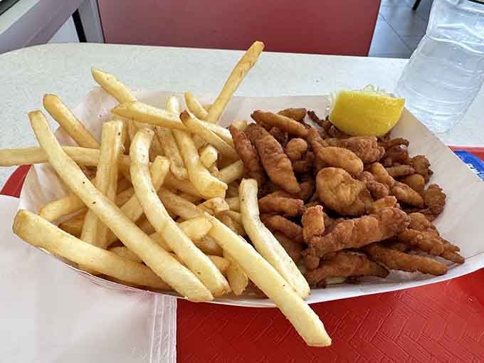 Fried clams and fries together create the kind of seafood-meets-comfort-food harmony that deserves its own symphony.