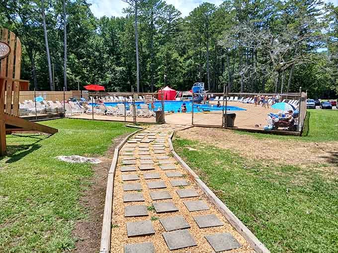The swimming pool beckons on hot Alabama days, fed by the same ancient water that carved these magnificent caverns.