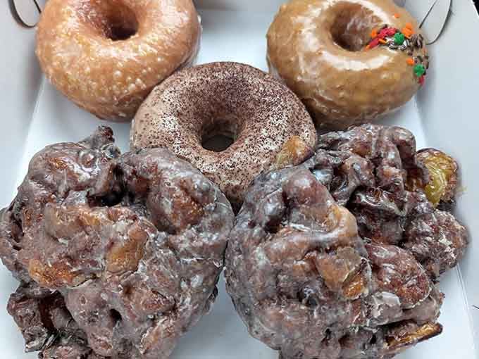 Those apple fritters look like they've been hitting the gym, all muscle and substance with sweetness to match their size.