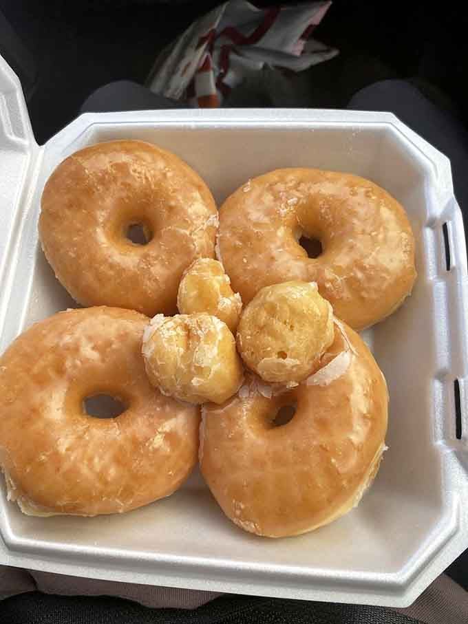 A box full of glazed donuts and donut holes is basically a choose-your-own-adventure in carbohydrate form.