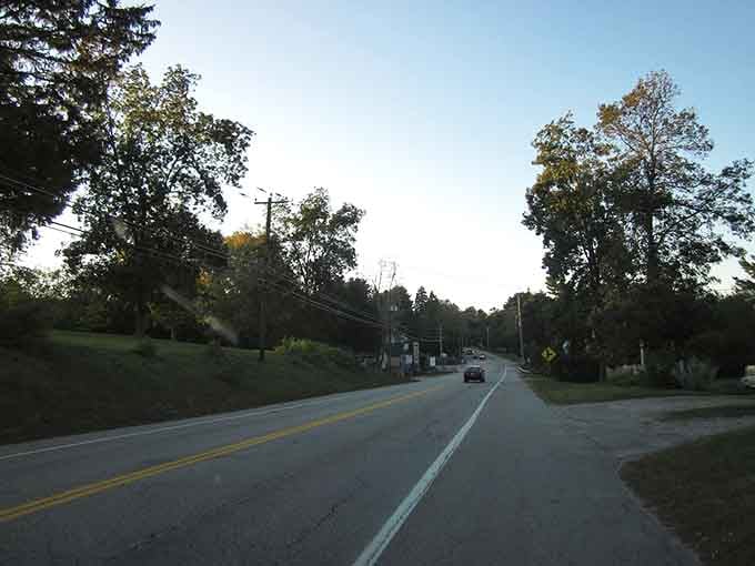The double yellow lines are practically the only modern addition to this timeless stretch of Connecticut countryside.