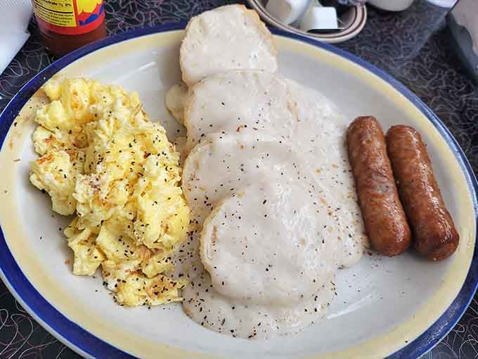Biscuits drowning in gravy with eggs on top, because sometimes more really is more.