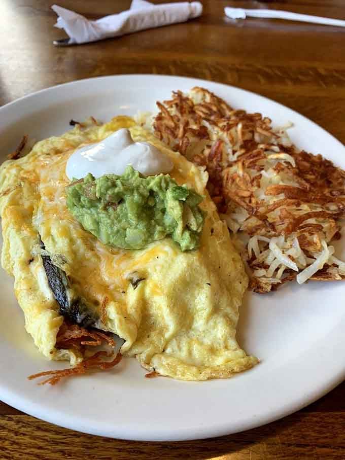 That golden omelet paired with crispy hash browns is the breakfast duo we all need daily.