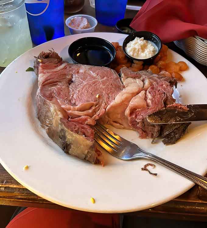 Prime rib so tender it's practically waving a white flag before your fork even arrives at the plate.
