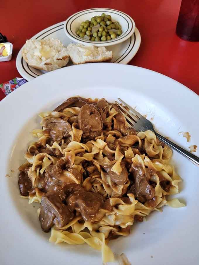 Beef stroganoff over egg noodles brings comfort food vibes that transcend any particular mealtime designation.