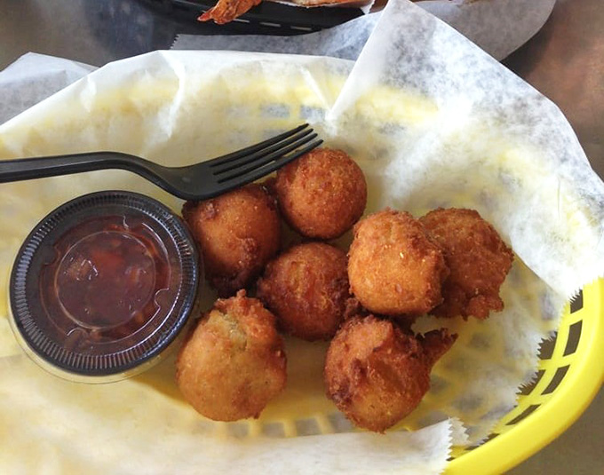 Behold the hush puppies that launched a thousand return visits, golden spheres of cornmeal bliss with impeccable texture throughout.