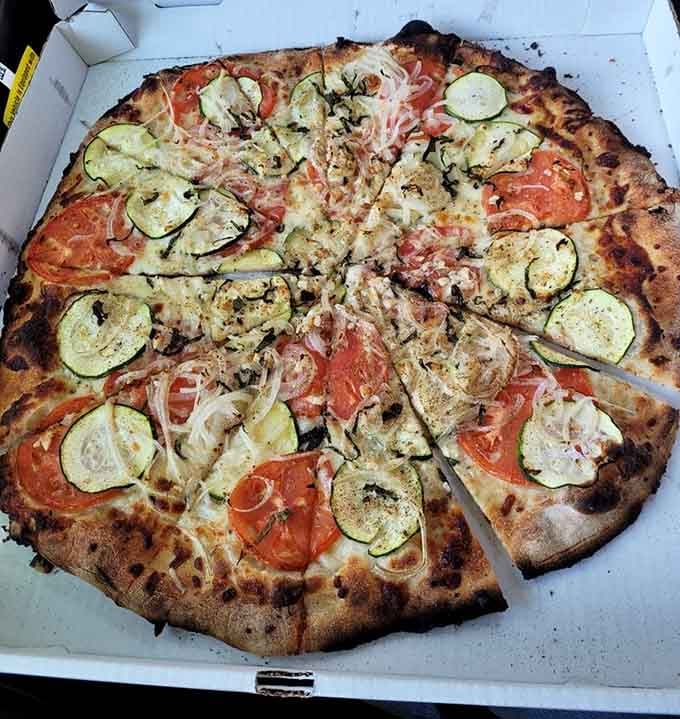 The Garden Special loads up fresh vegetables on that legendary crust for a lighter pizza experience.