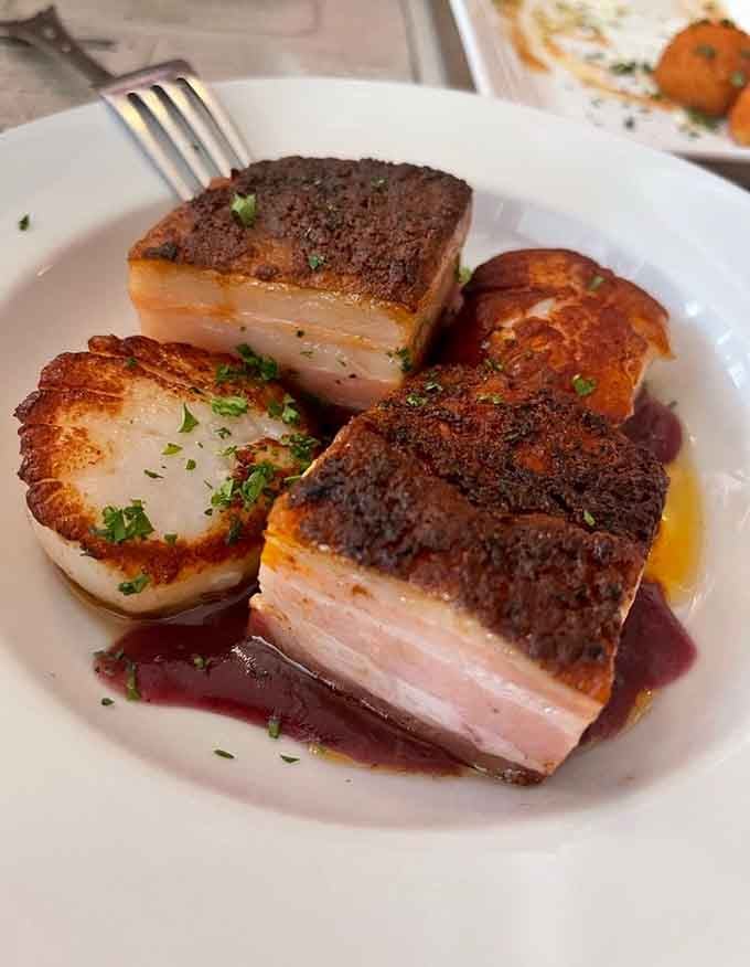 When pork belly and scallops share a plate, everybody wins, especially your taste buds and soul.
