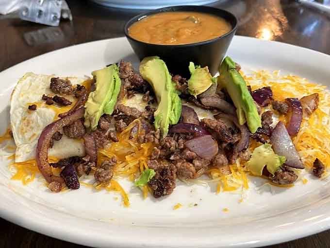Carne asada swimming in sauce and cheese is the kind of indulgence that makes life worth living.