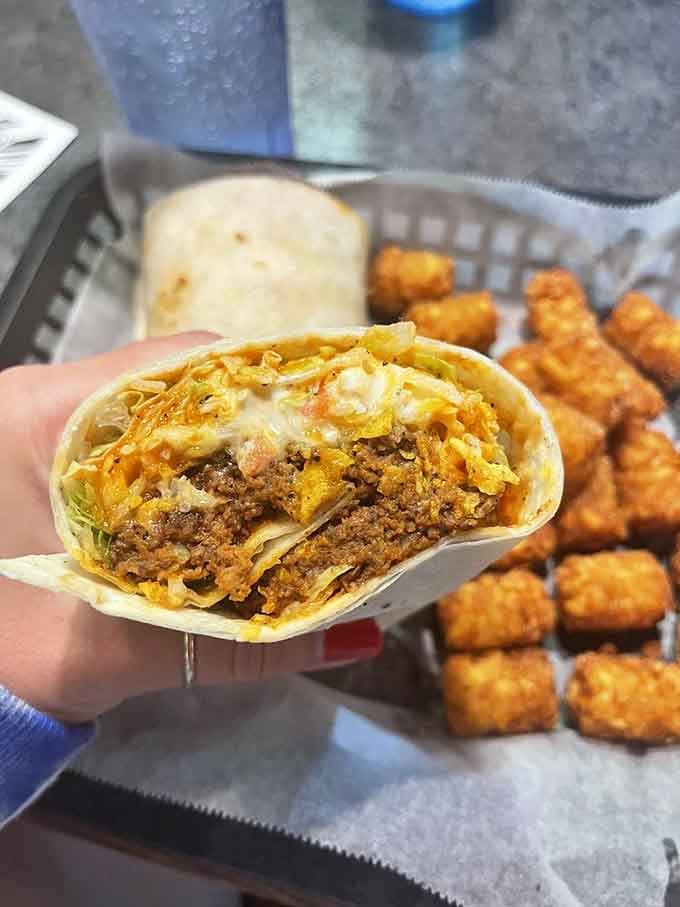 A burrito stuffed so full it practically needs its own origin story and maybe a sidekick too.