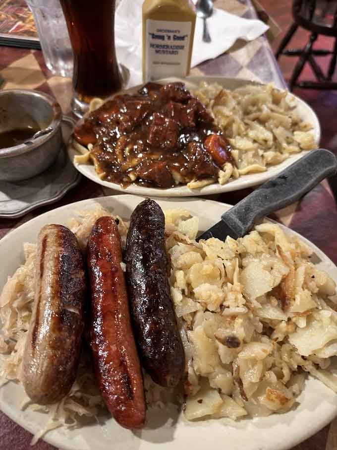 Three glorious wursts and goulash on one table means someone's about to have the best Tuesday night ever.