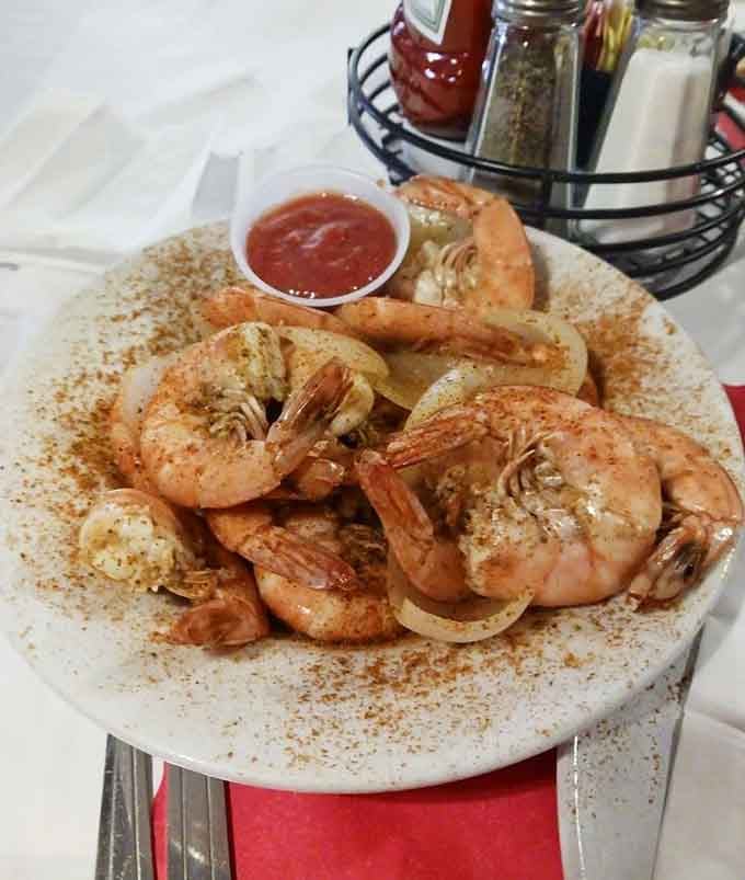 Steamed shrimp glistening with seasoning, ready to disappear faster than your dinner reservation.