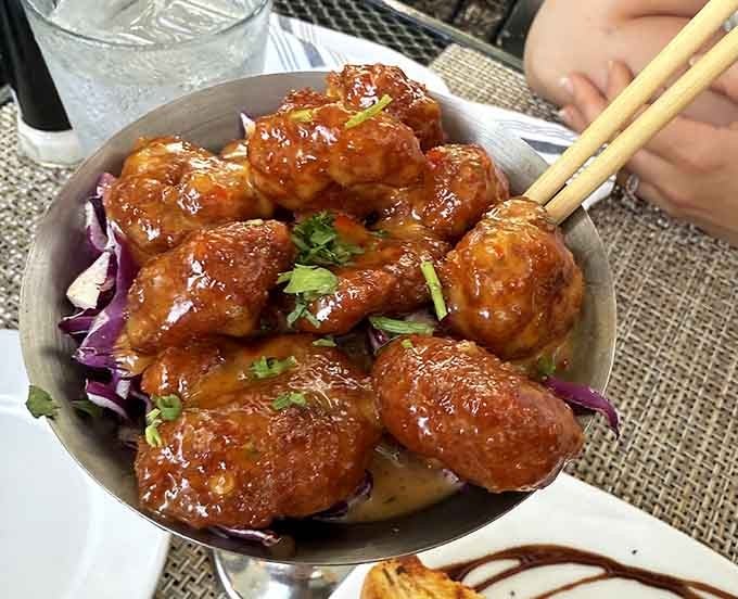 Thai Shrimp glistening with sauce, proving that good things really do come in delicious, bite-sized packages.