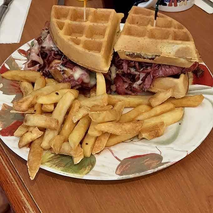 Pastrami tucked between waffles with fries might sound wild, but trust the process and taste the magic.