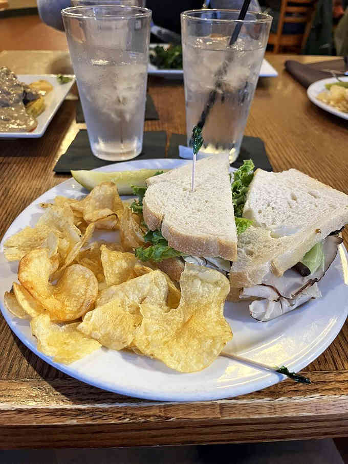 A proper turkey sandwich with chips proves that simple done right beats fancy done wrong every single time.