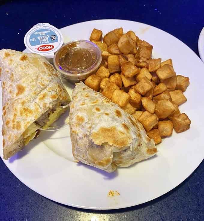 Breakfast burritos wrapped tight with crispy home fries on the side, because some mornings require serious fuel for living.