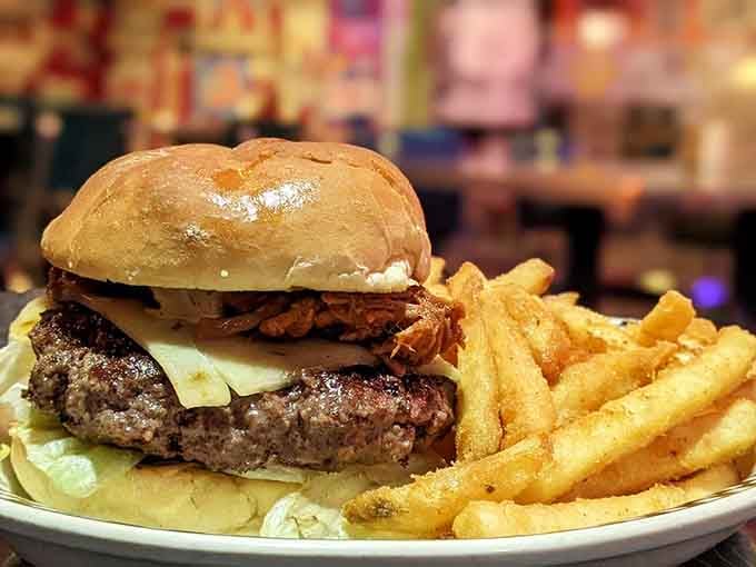 Sancho's Burger comes loaded with enough toppings to require both hands and possibly a structural engineering degree.